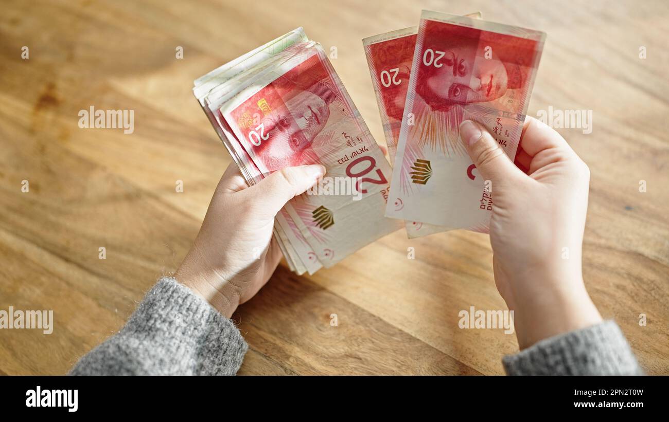 Hands woman counting shekels hi-res stock photography and images - Alamy