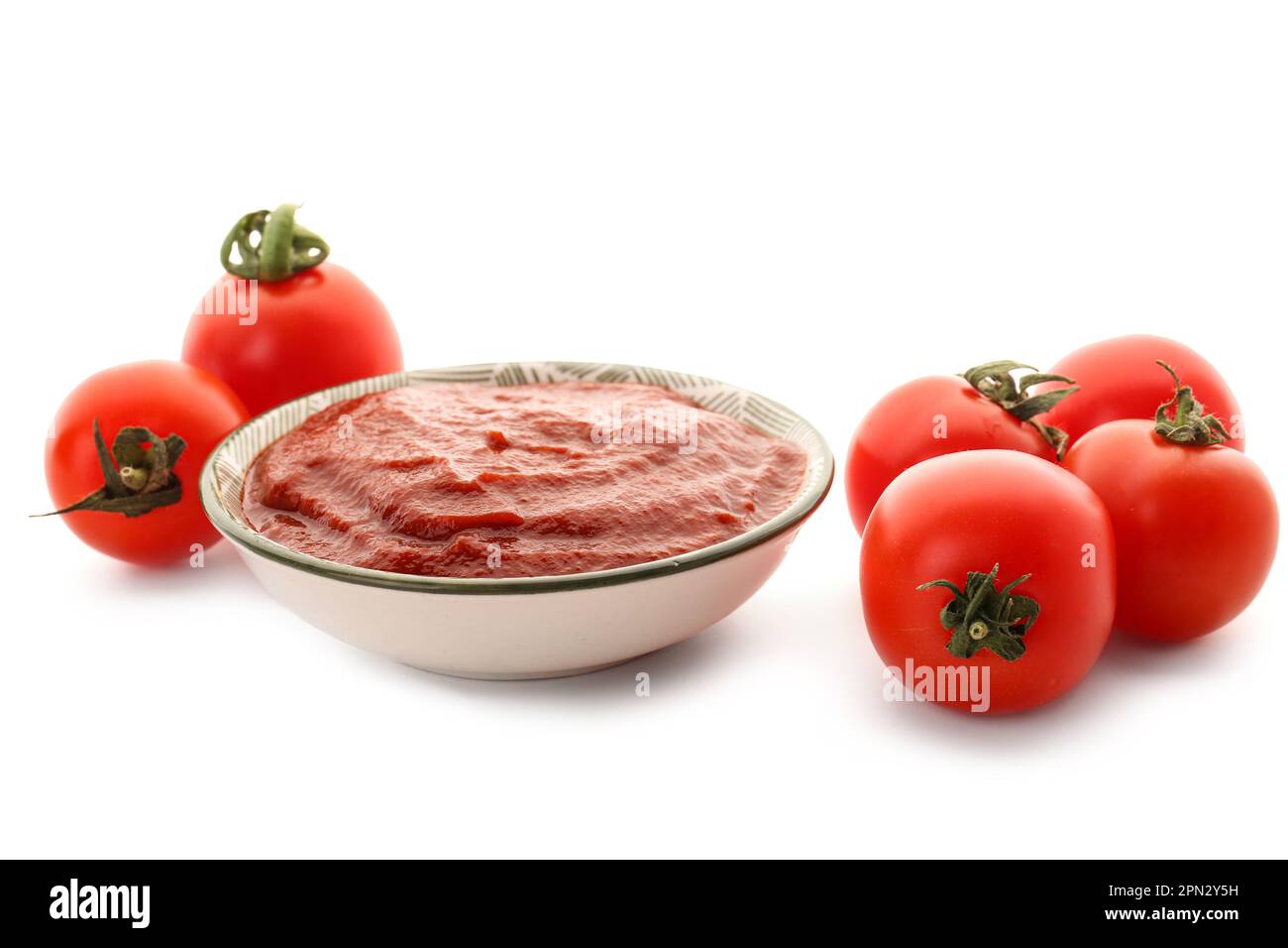 Bowl of tasty tomato paste isolated on white background Stock Photo - Alamy