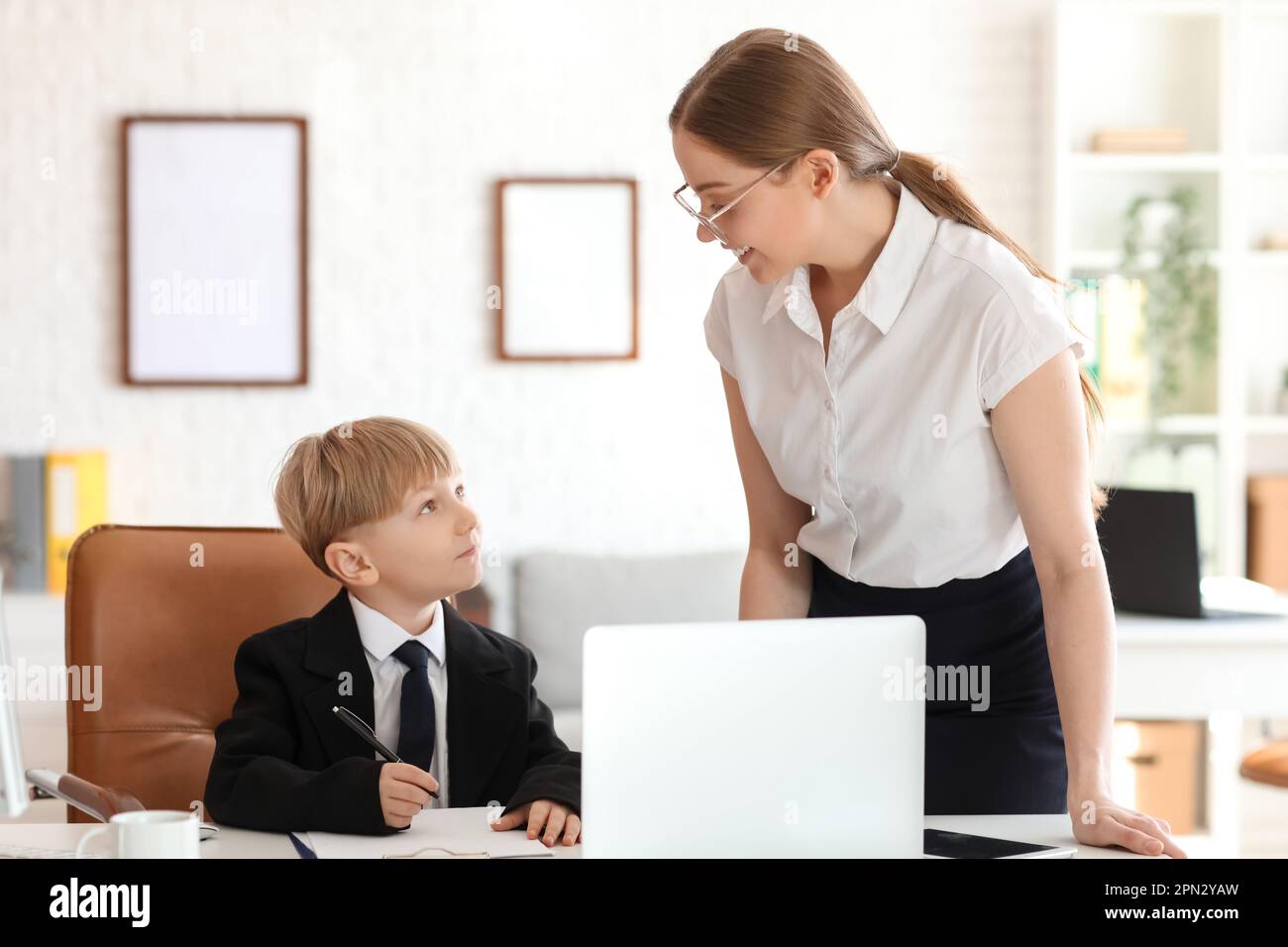 Funny little businessman working with secretary in office Stock Photo ...