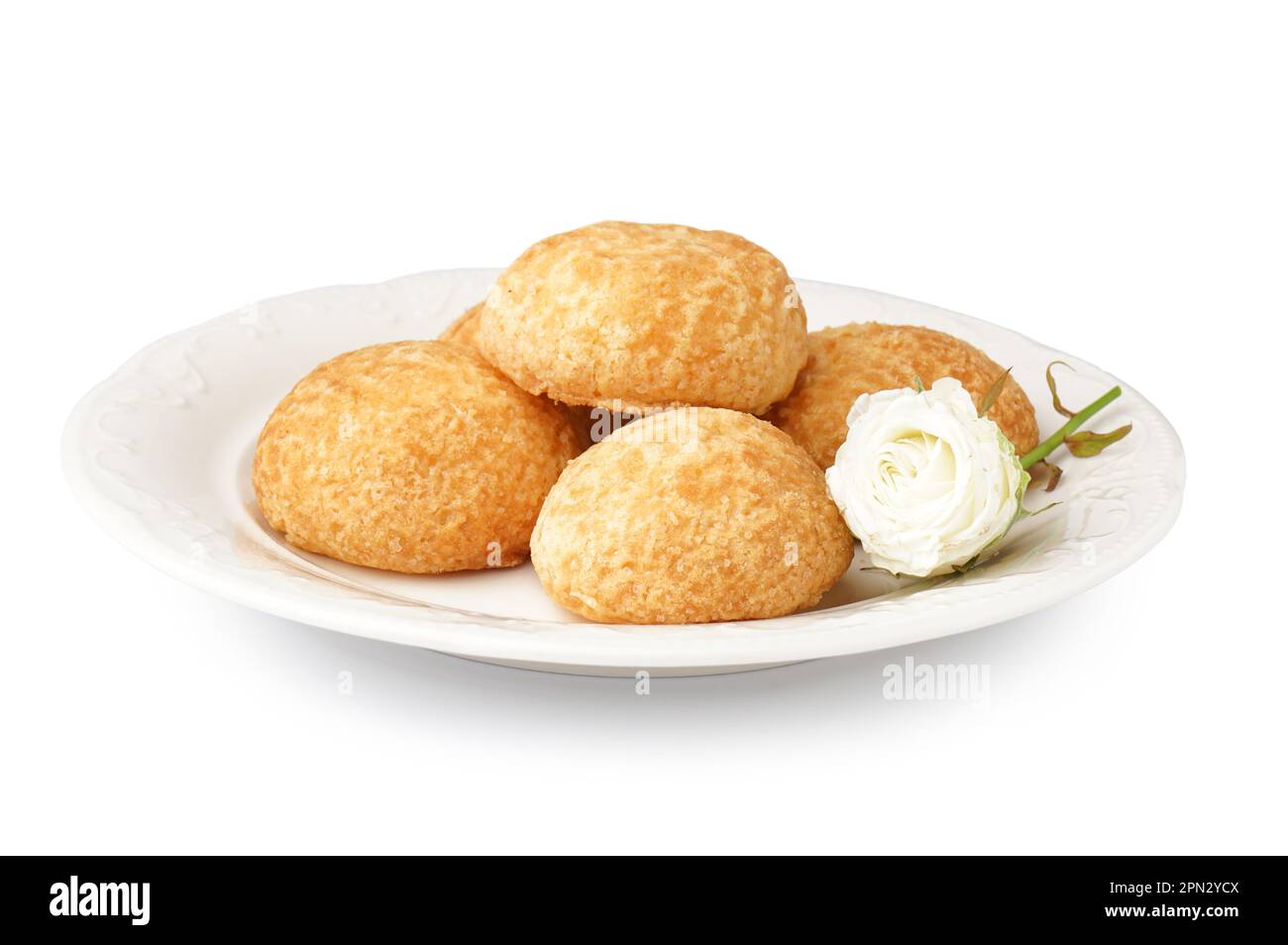 Plate with delicious choux pastry on white background Stock Photo - Alamy