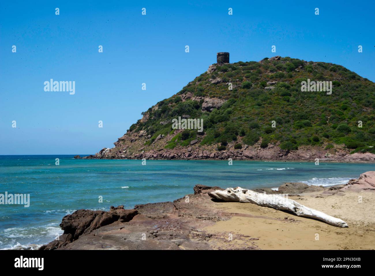 Rocky shore and beach at Porto Ferro Bay and the Black Tower Sassari ...