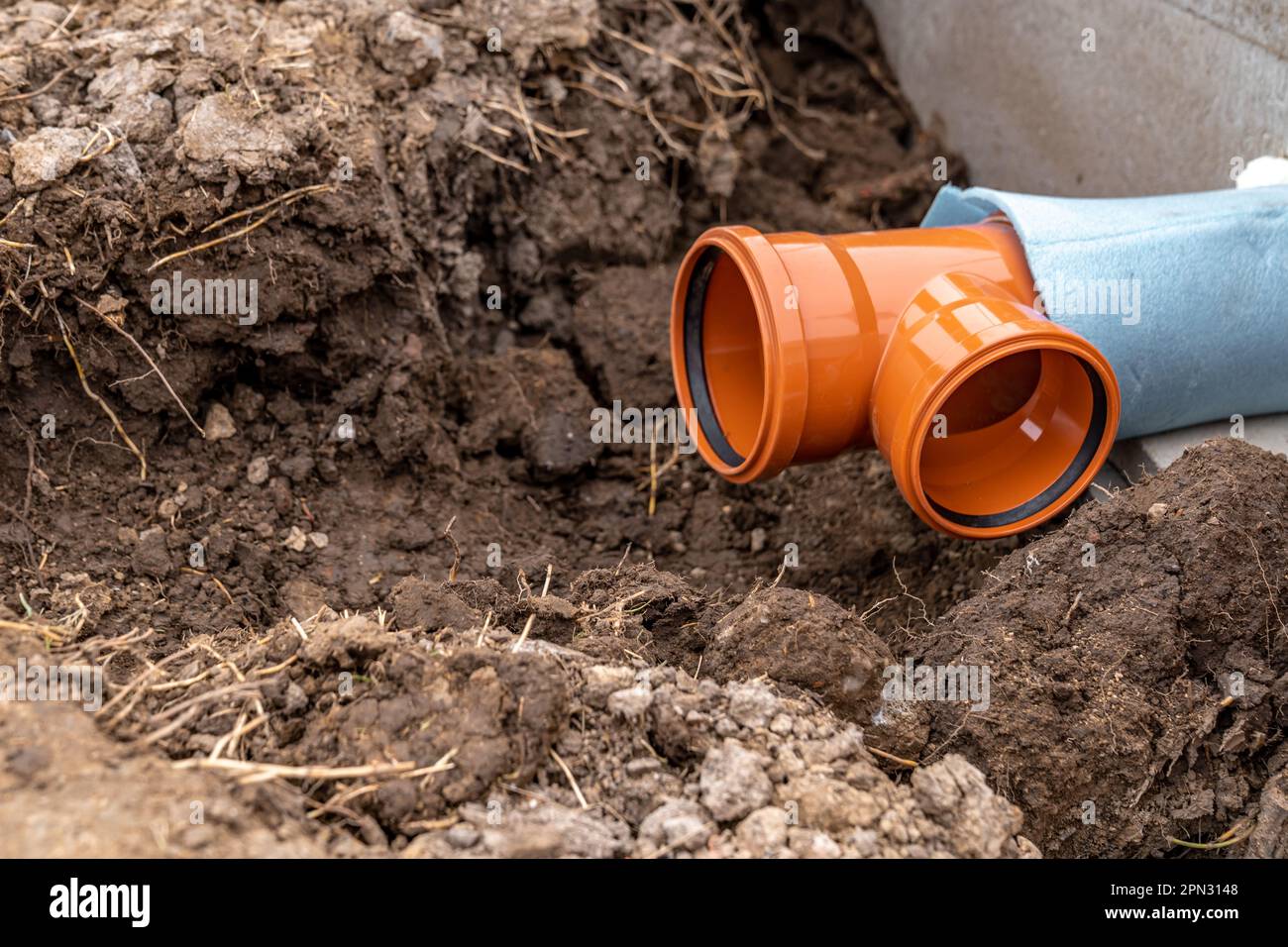 plastic pvc waste sewer pipe in the ground. construction site Stock ...