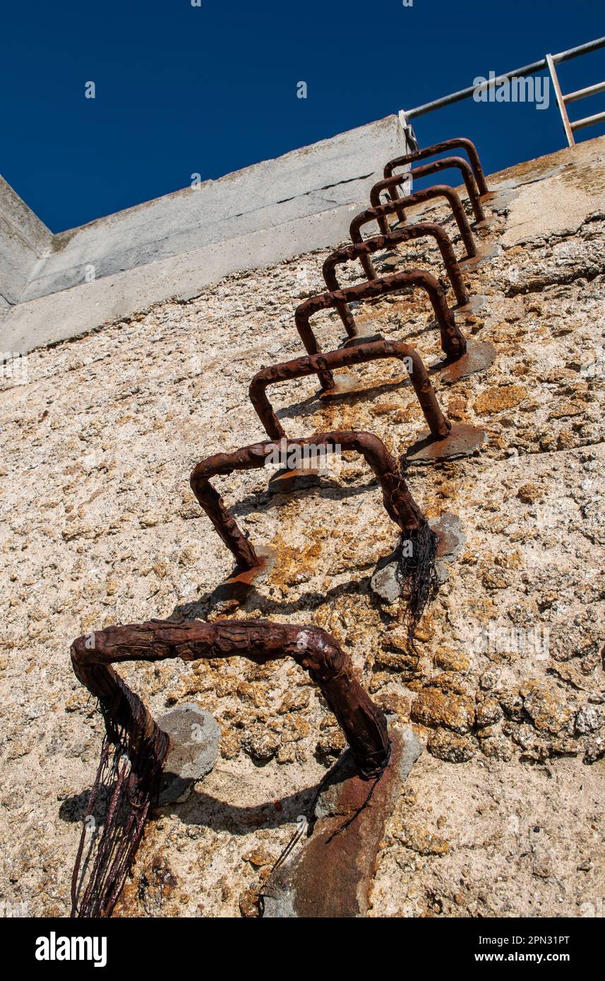 Rusty Iron Ladder On Concrete Harbor Wall In Guilvinec, France Stock ...