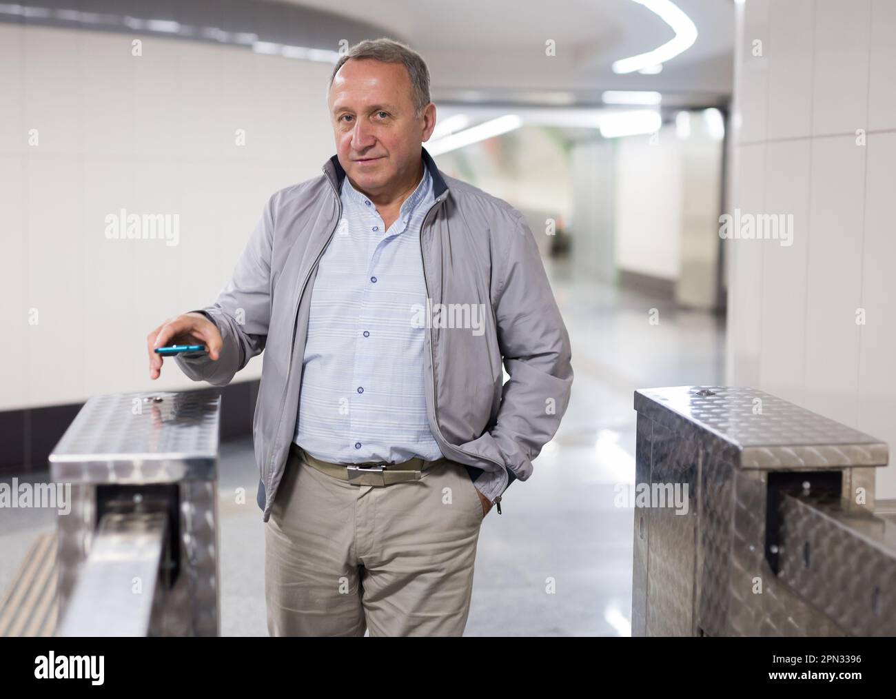 Man entering subway station hi-res stock photography and images - Alamy