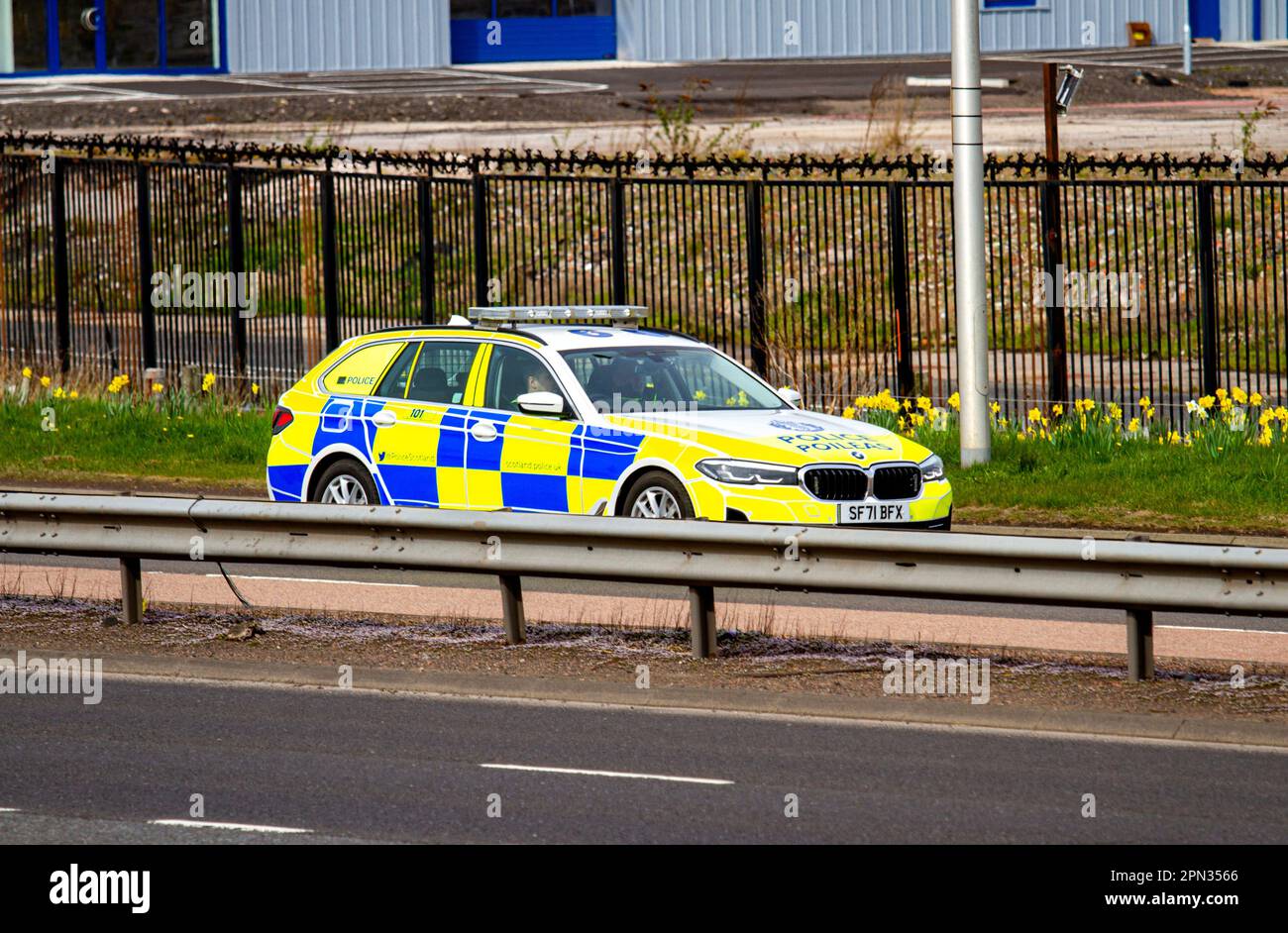 A Police Scotland police car travelling along the Kingsway West Dual ...