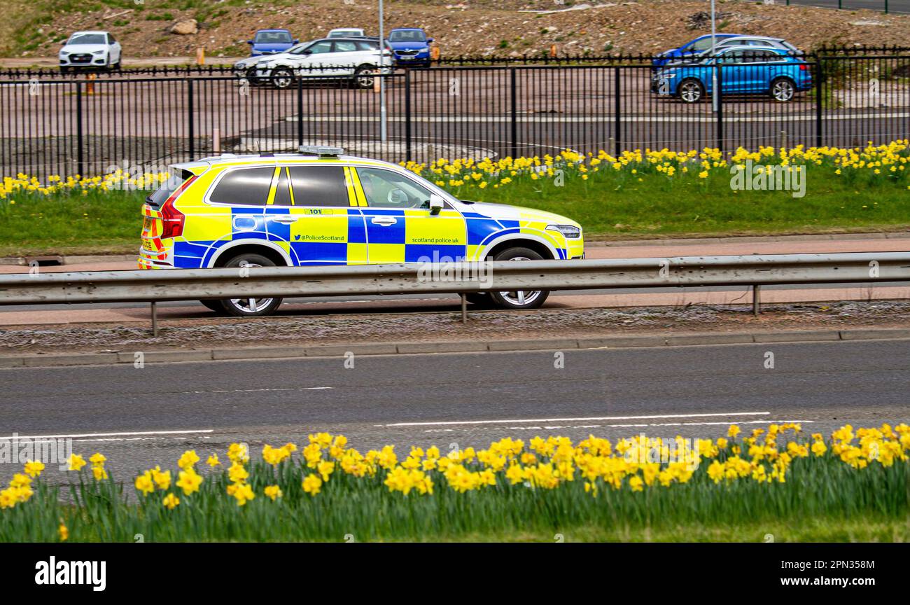 A Police Scotland police car travelling along the Kingsway West Dual ...