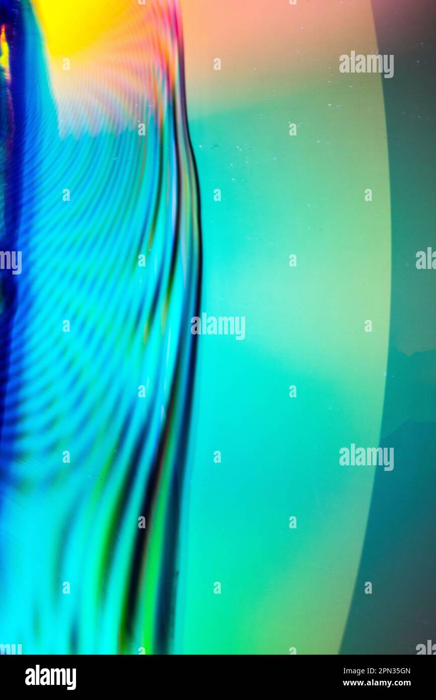 A Holographic Shiny Wavy Abstract Background With Water Texture Visual ...