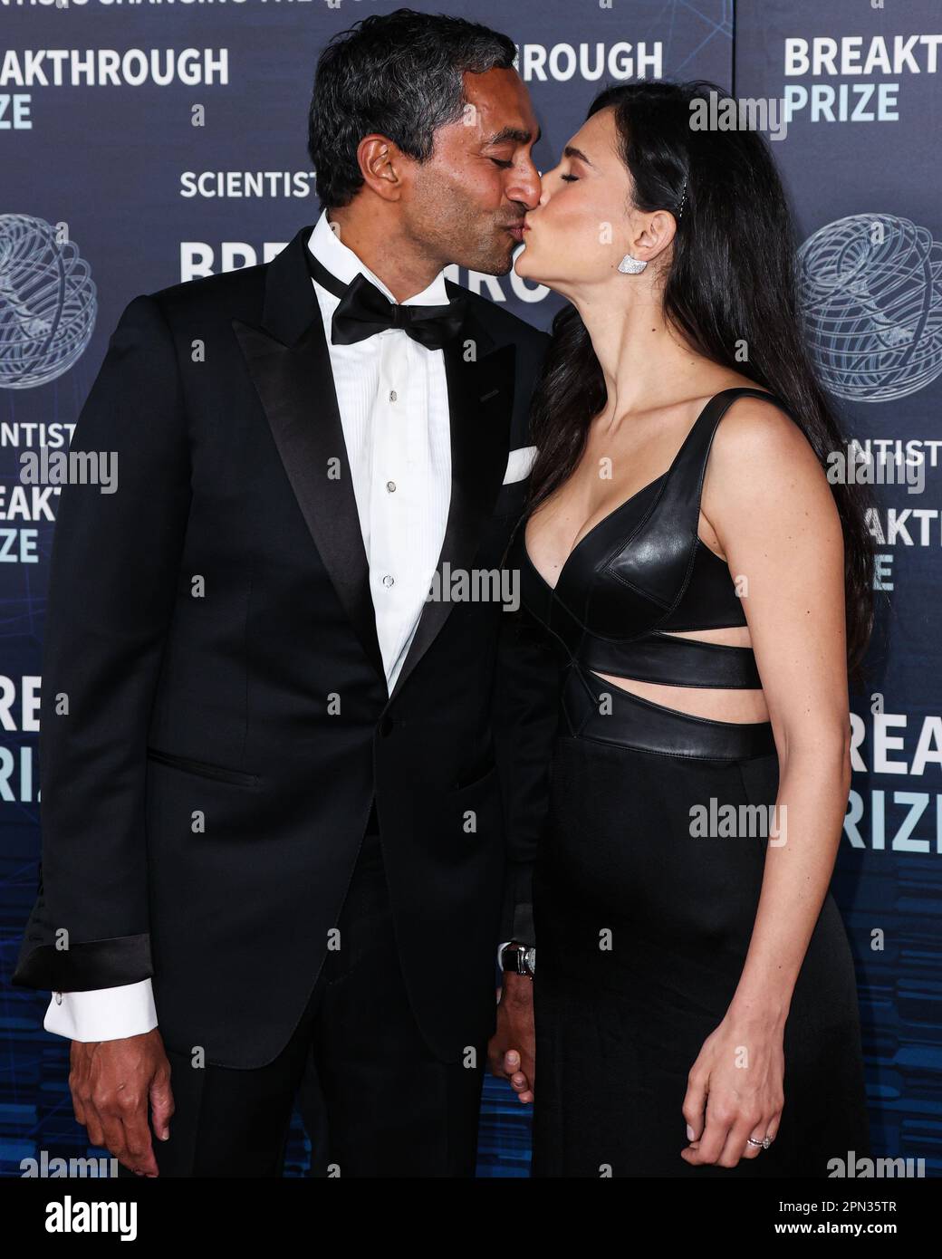 LOS ANGELES, CALIFORNIA, USA - APRIL 15: Chamath Palihapitiya and Nathalie Dompe arrive at the ...
