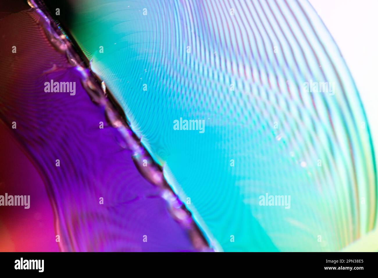 A Holographic Shiny Wavy Abstract Background With Water Texture Visual ...