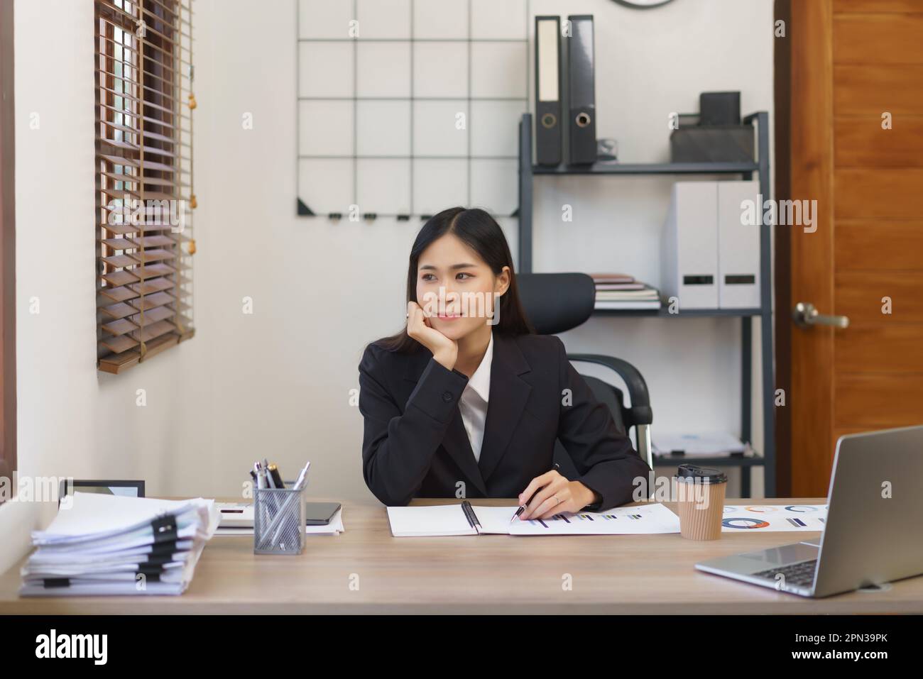 Secretary concept, Female secretary look outside to thinking something ...