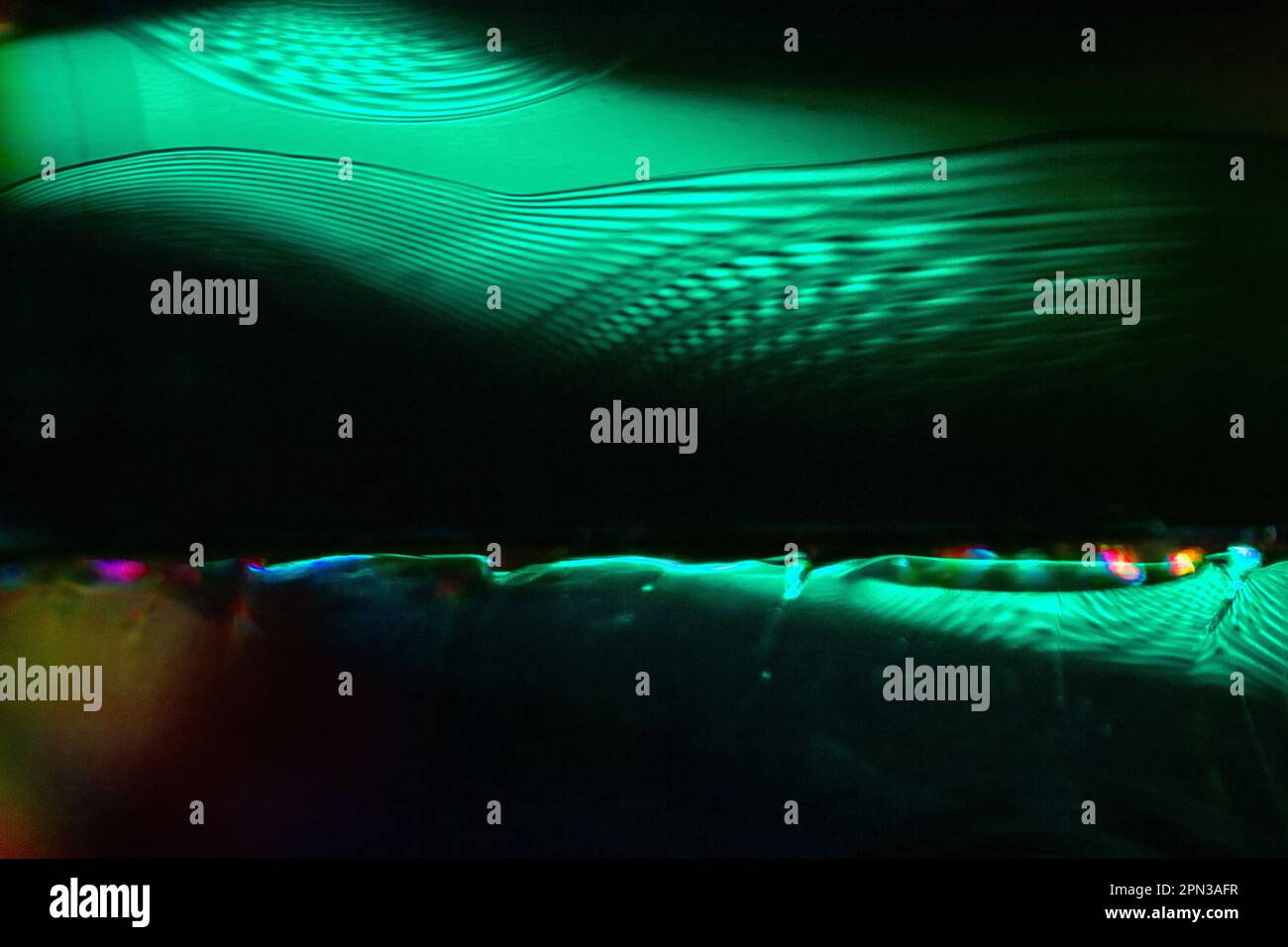 A Holographic Shiny Wavy Abstract Background With Water Texture Visual ...