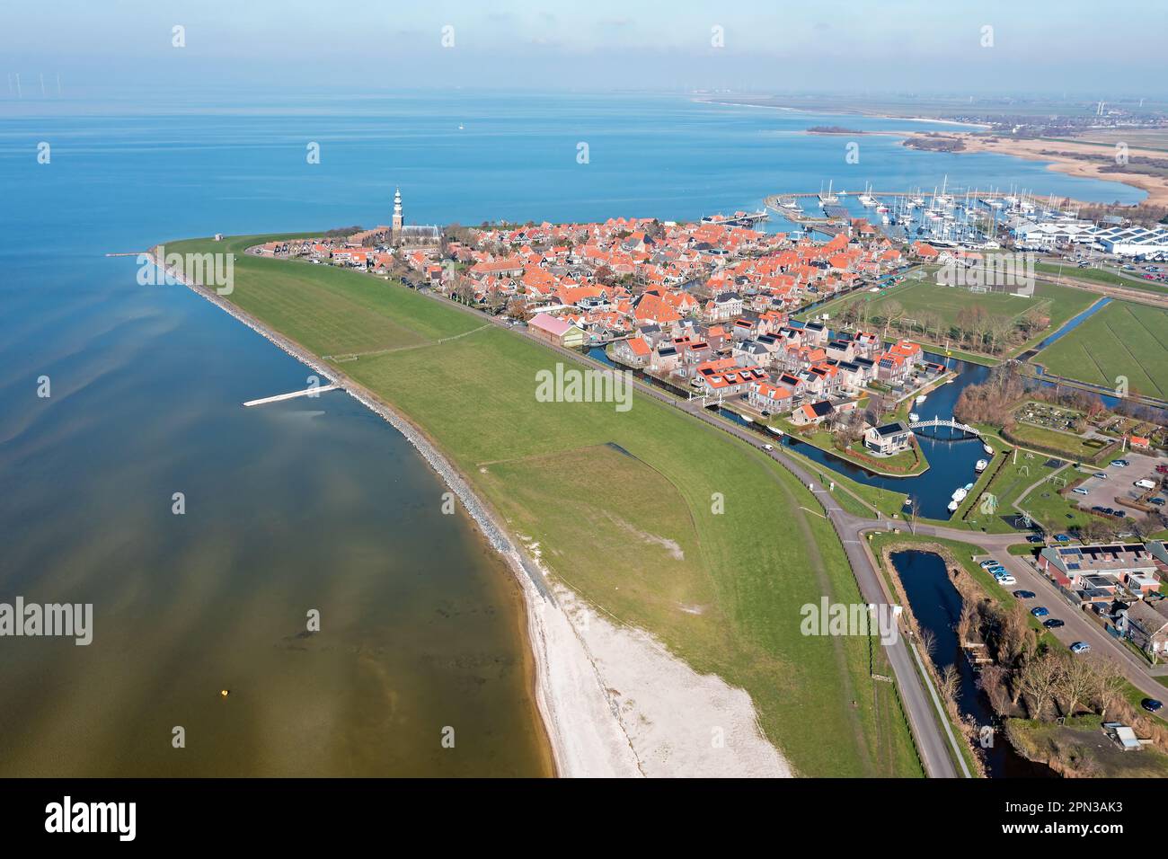 Aerial from the historical city Hindeloopen at the IJsselmeer in the ...