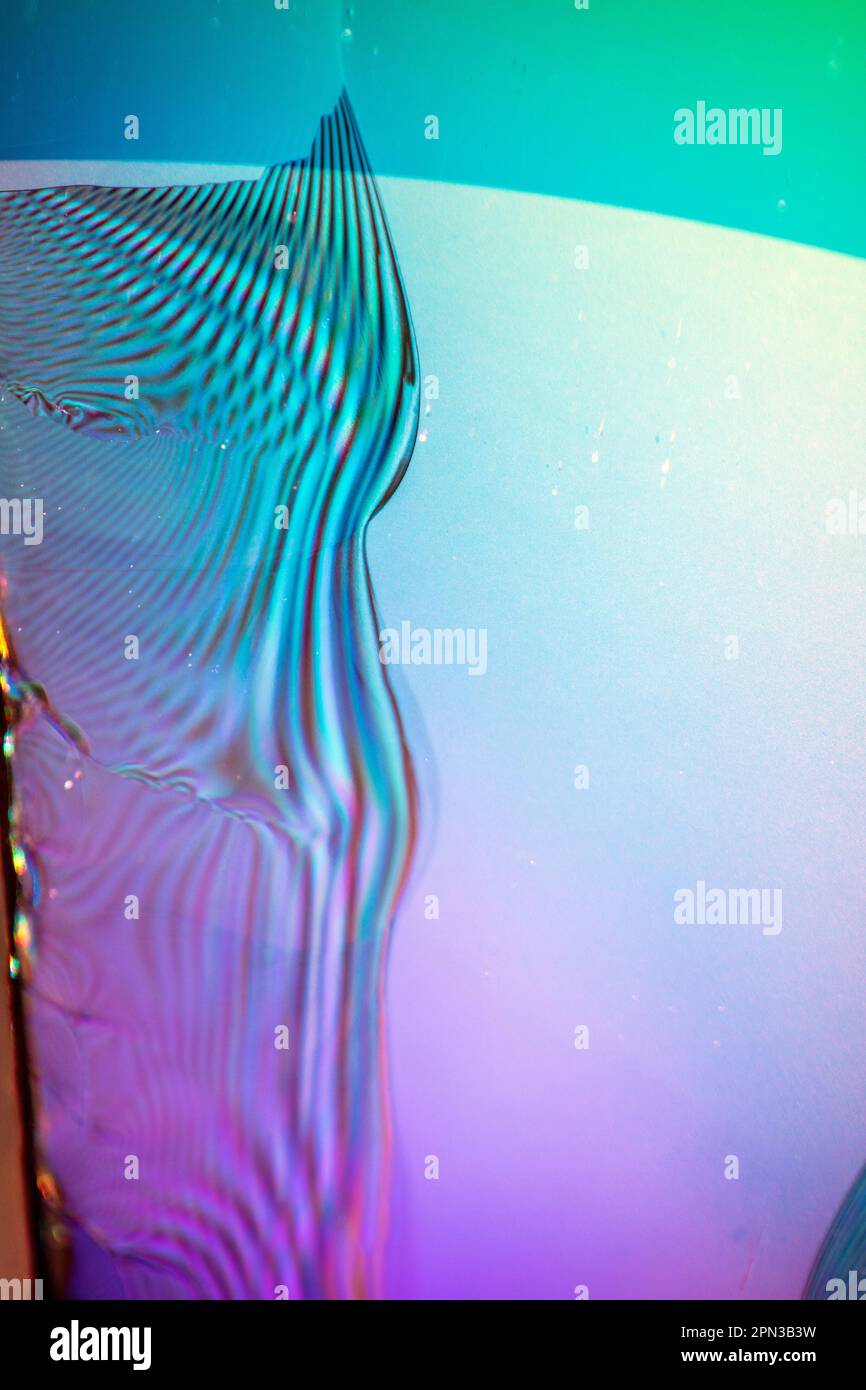 A Holographic Shiny Wavy Abstract Background With Water Texture Visual ...