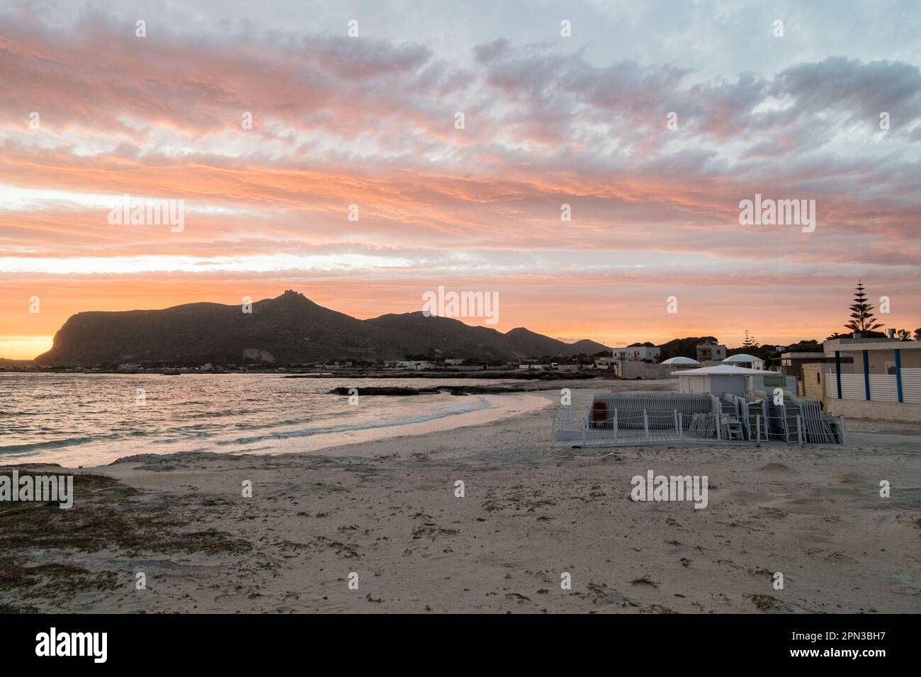 Lido Burrone beach in Favignana island at sunset, Sicily, Italy Stock ...