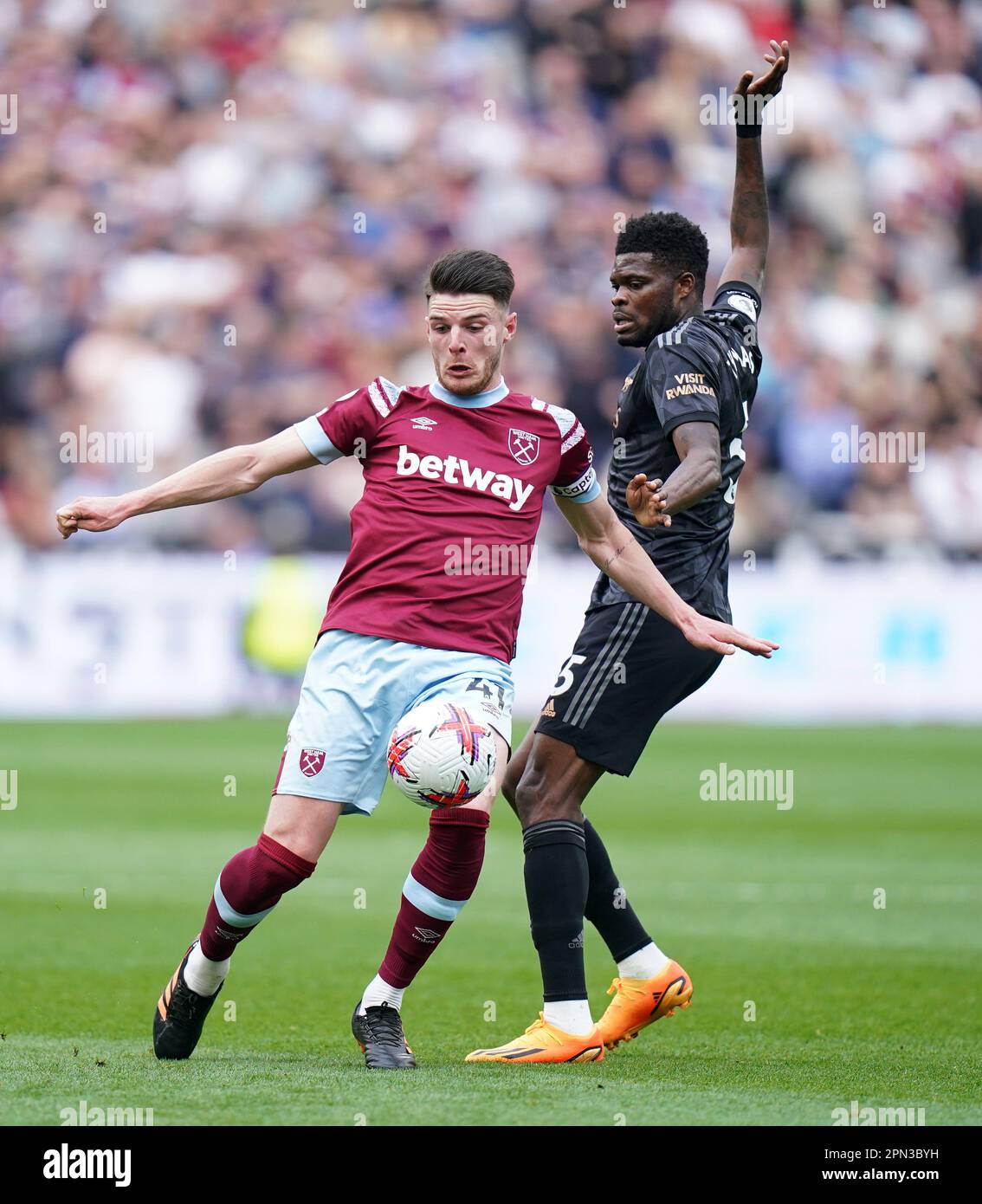 West Ham United's Declan Rice (left) and Arsenal's Thomas Partey battle ...