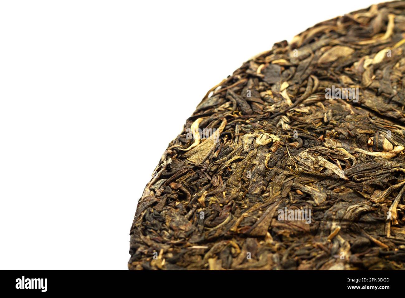 Piece of fermented Chinese Shen Puer Tea isolated on white background ...