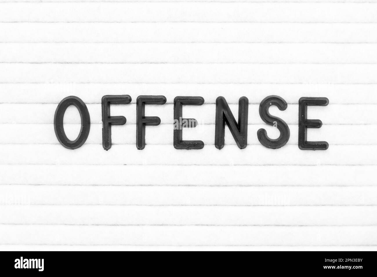Black color letter in word offense on white felt board background Stock ...