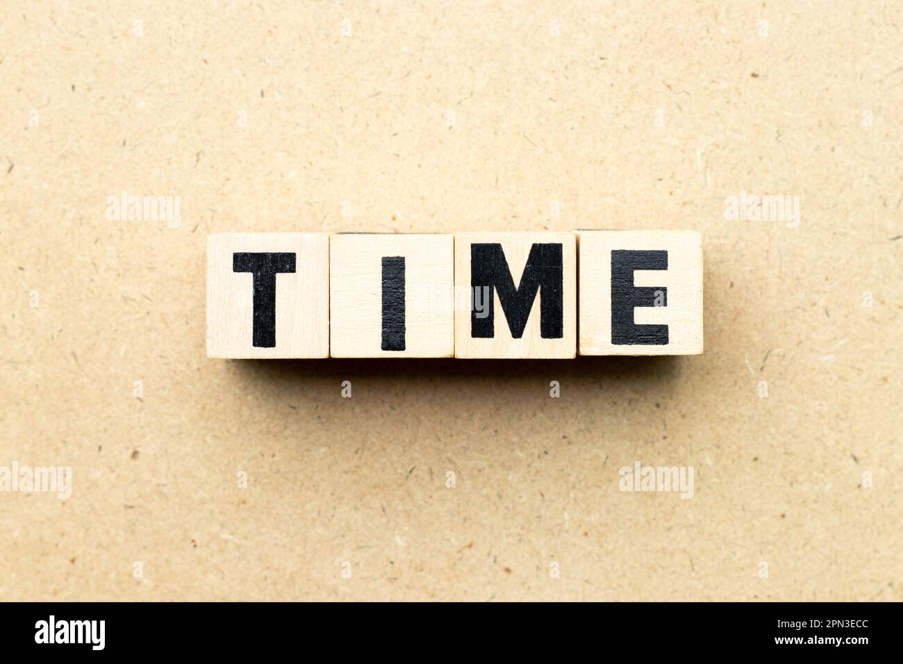 Alphabet letter block in word time on wood background Stock Photo - Alamy