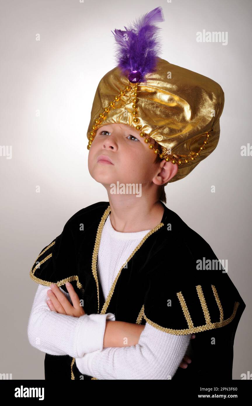 An elder sultan or sheik with a sword isolated over black Stock Photo ...