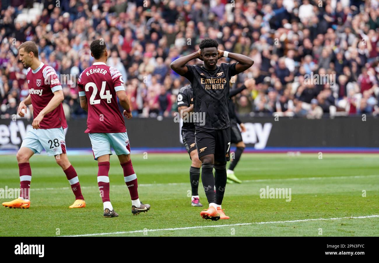 Arsenal's Bukayo Saka reacts after missing a penalty during the Premier ...