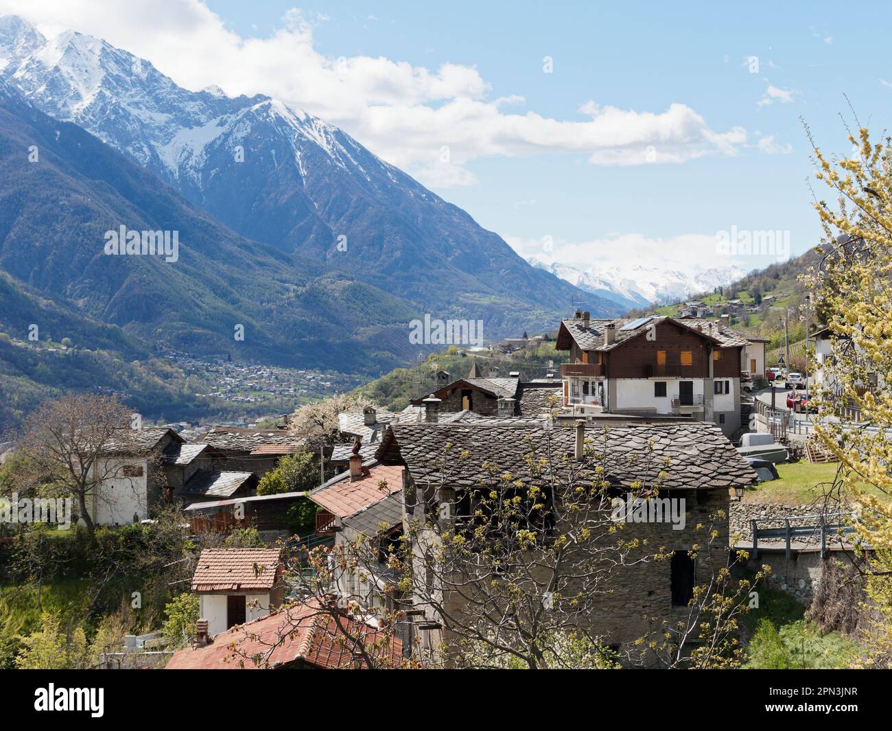 Traditional houses in an alpine village near Nus in the Aosta Valley ...