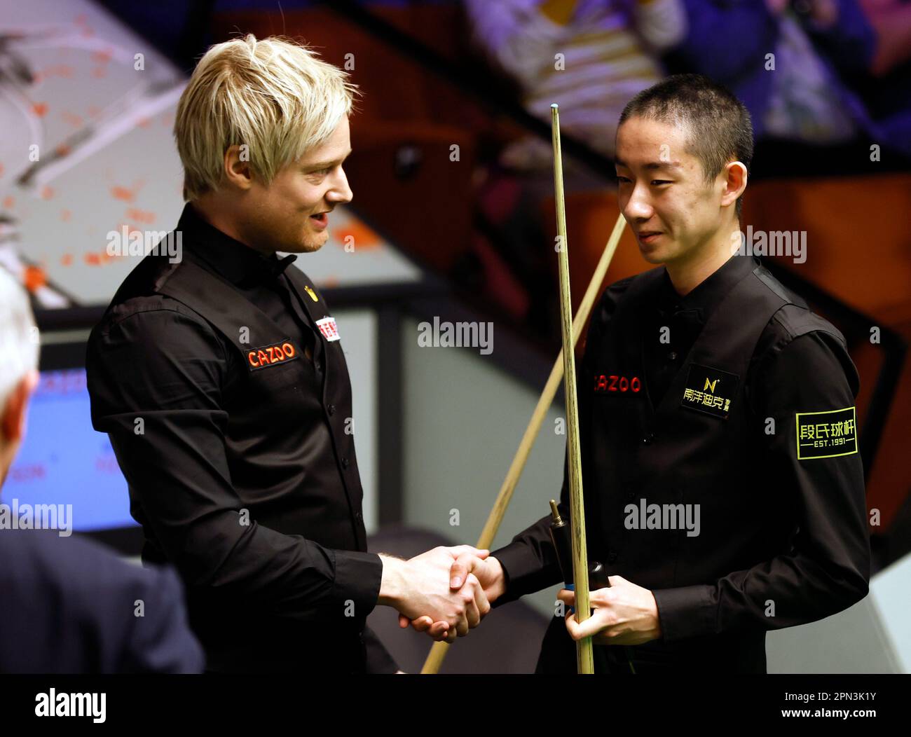 Wu Yize congratulates Neil Robertson on his second break of 146 during ...
