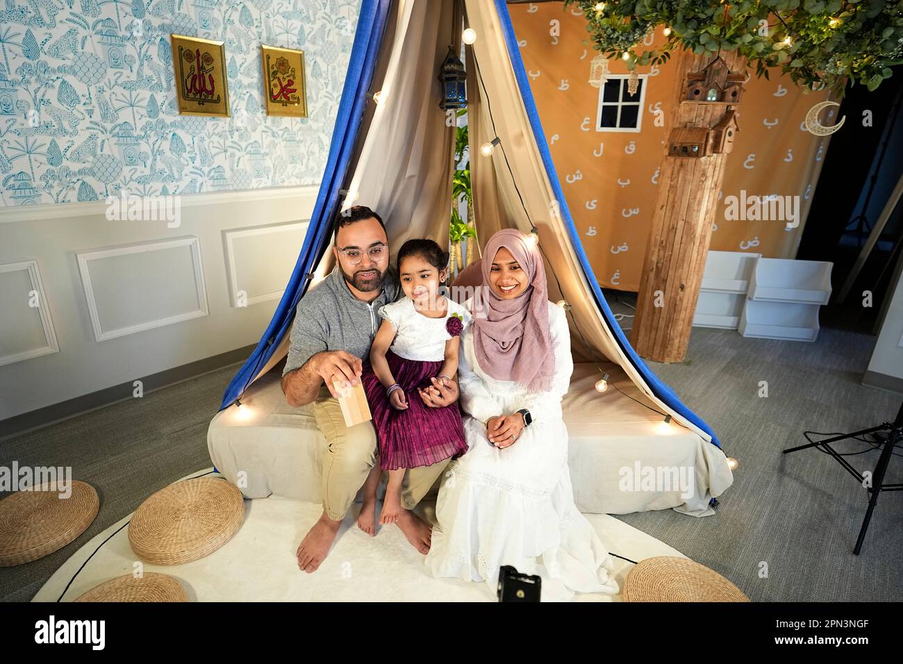 Amin Aaser, left, performs with his wife, Sana and daughter, Kauthar ...