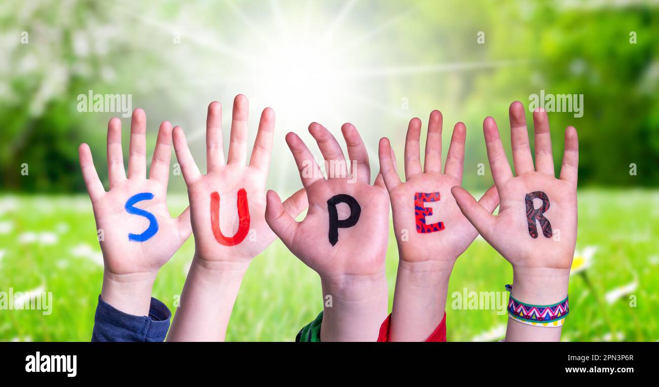 Children Hands Building Word Super, Grass Meadow Stock Photo - Alamy