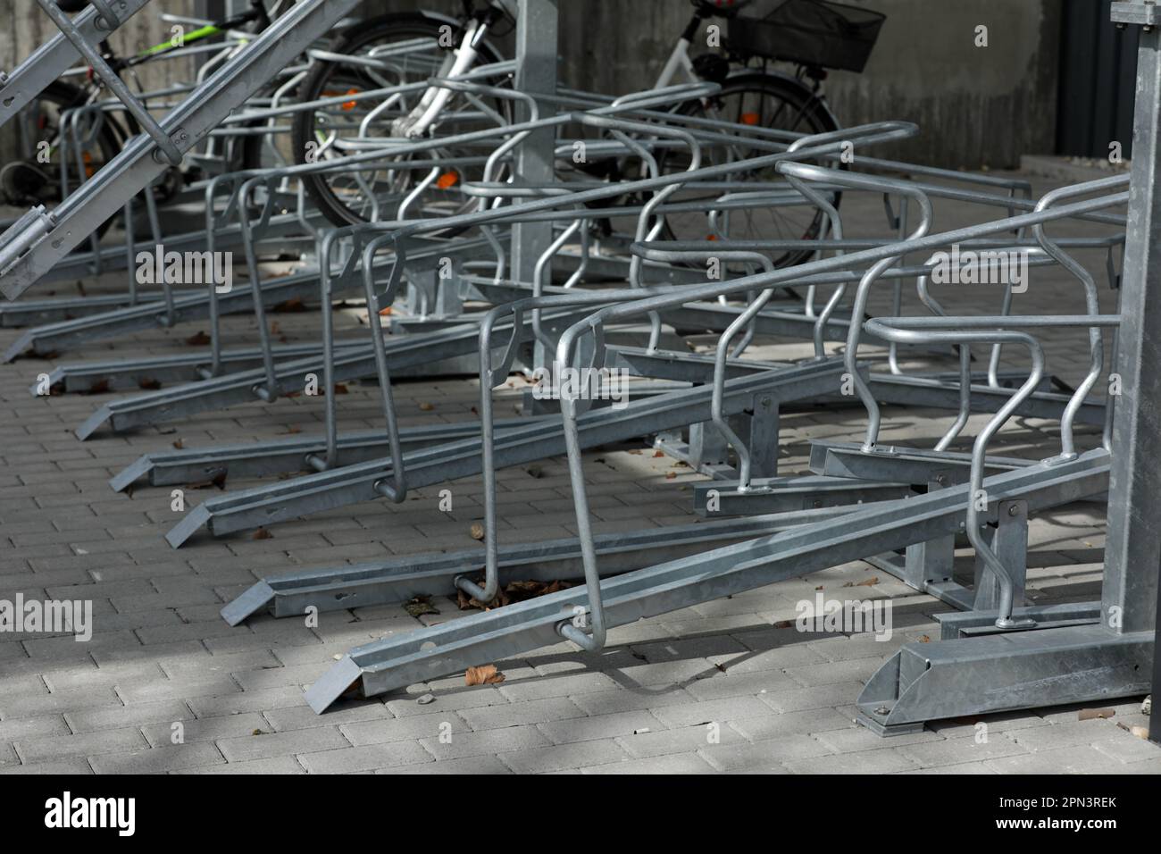 Bike racks at the train station Stock Photo - Alamy