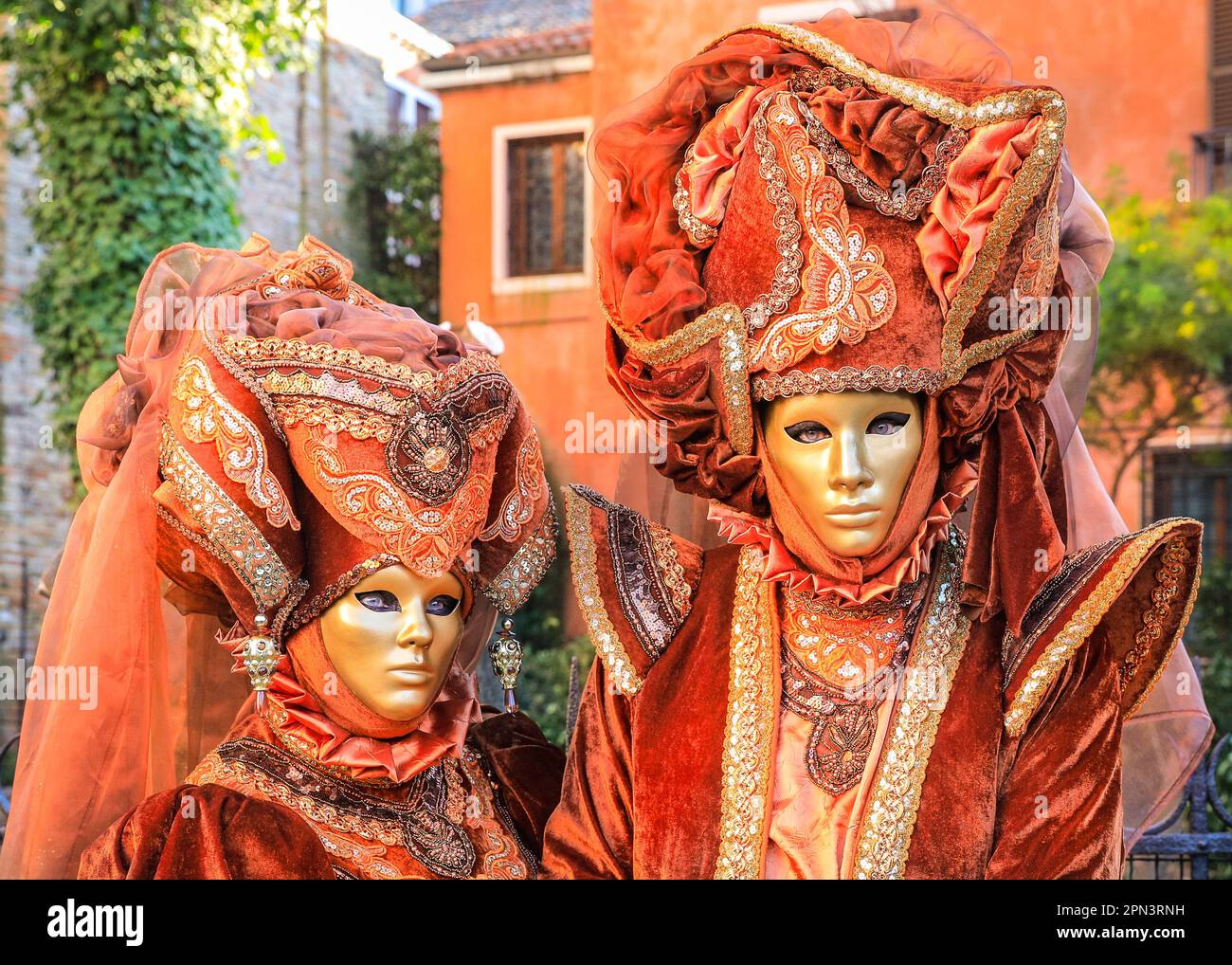 Venice Carnival, female participants in Venetian baroque costumes and ...