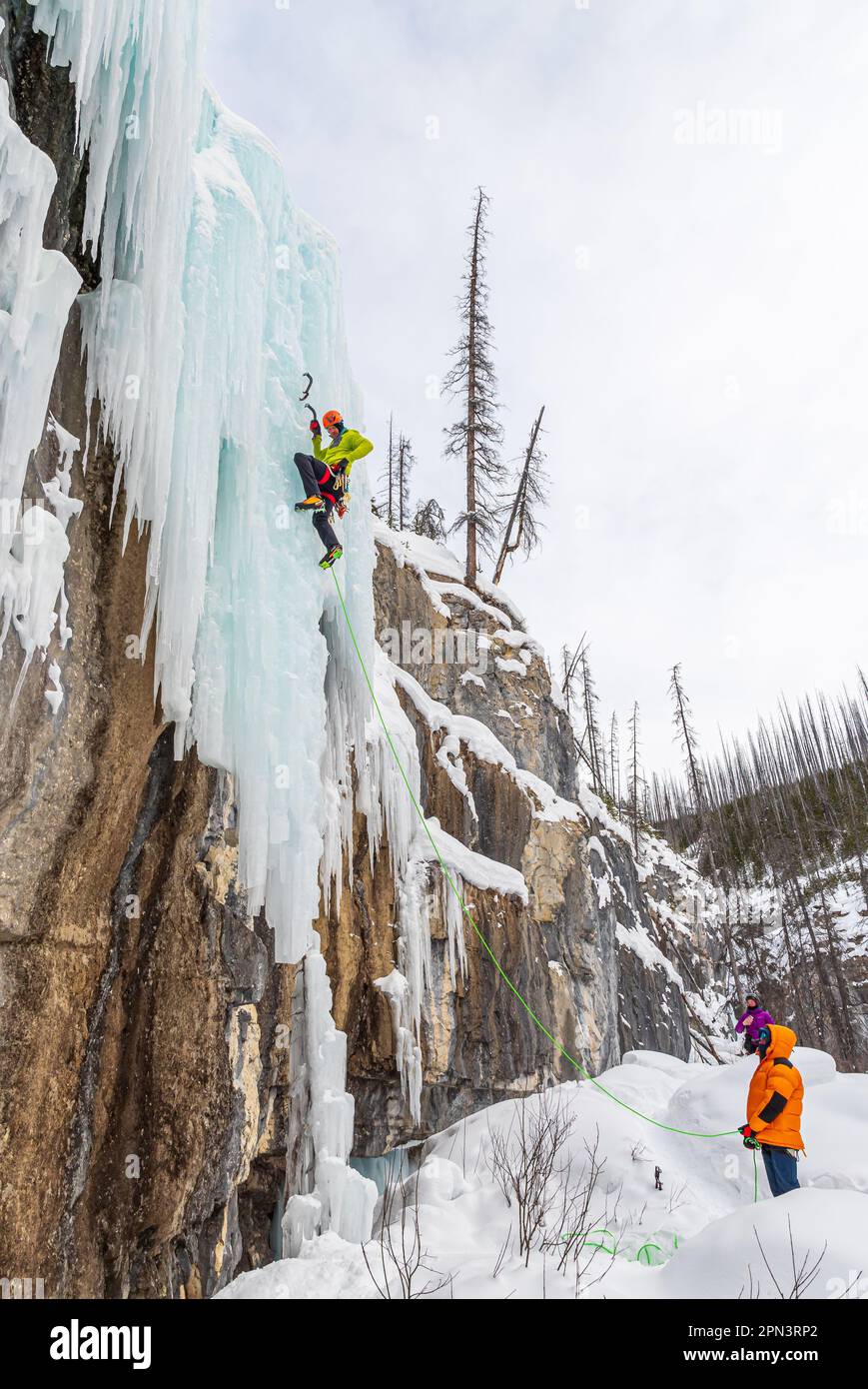 Elijah Weber and Rowan Lovell climbing in Haffner Creek in Canada Stock ...