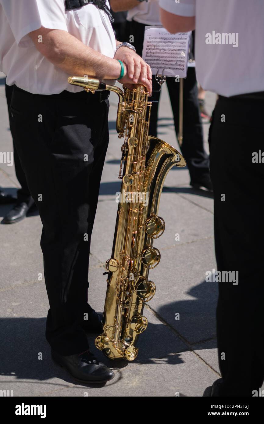 Madrid, Spain. 16th Apr, 2023. A musician carries a saxophone during a ...