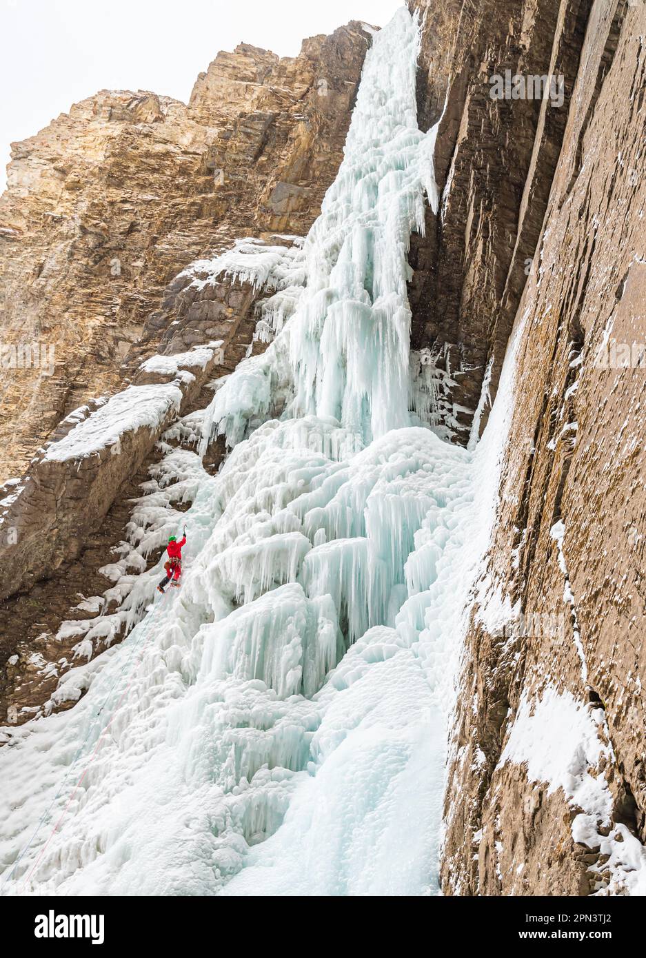 Marc Godbout climbing a route in called Whiteman Falls WI5-6 Stock Photo - Alamy