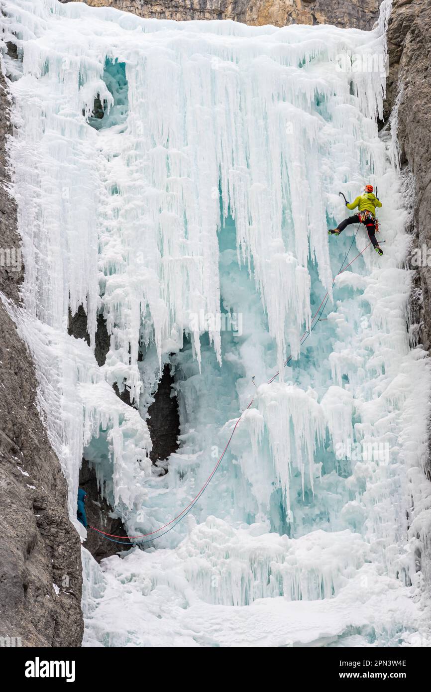 Elijah Weber climbing a route called Wicked Wanda WI4+ in Canada Stock ...