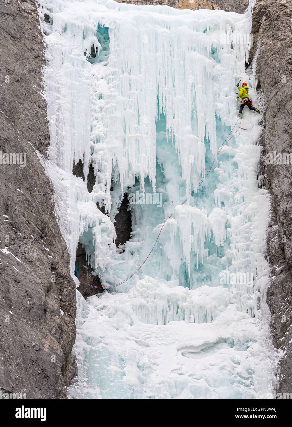 Elijah Weber climbing a route called Wicked Wanda WI4+ in Canada Stock ...