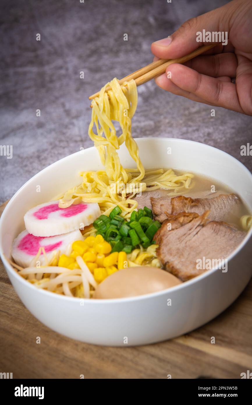 Fresh ramen noodles with garnish, pork tenderloin, eggs marinated in ...