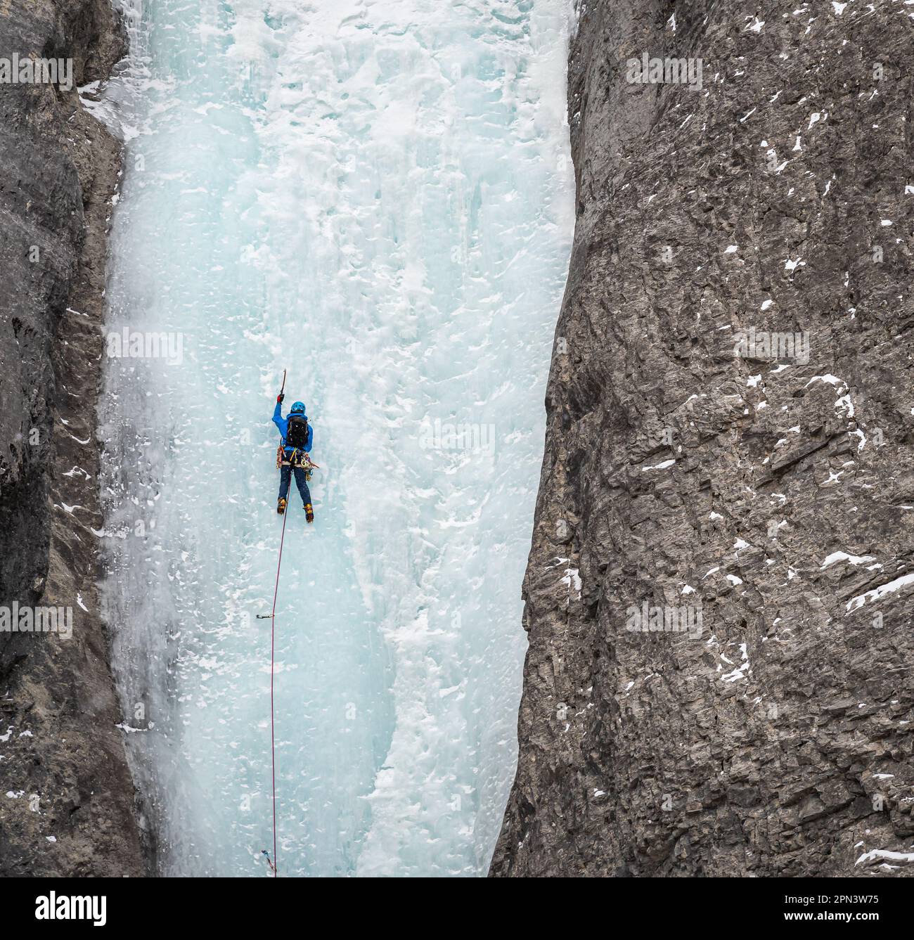 Rowan Lovell climbing a route called Wicked Wanda WI4+ in Canada Stock ...