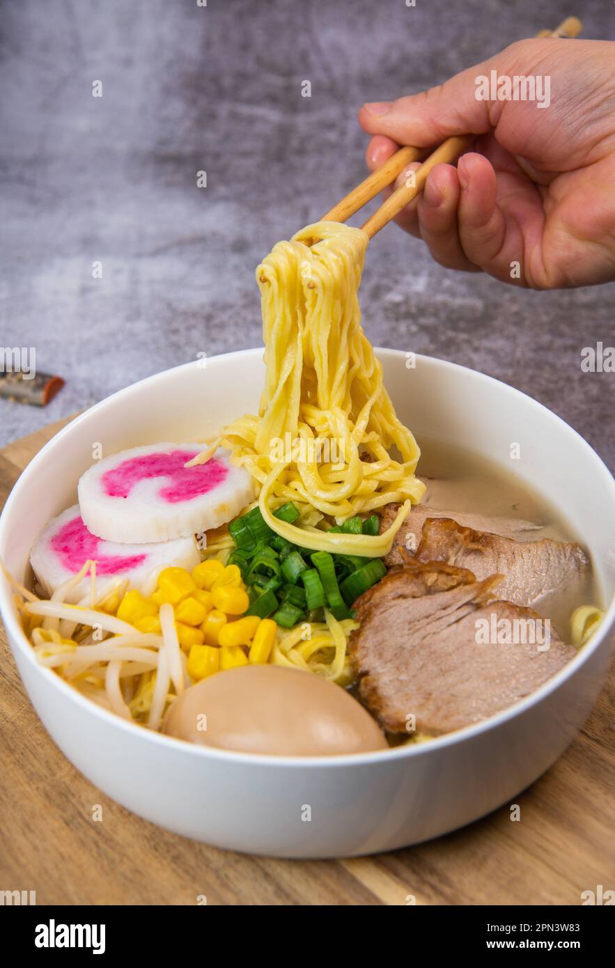 Fresh ramen noodles with garnish, pork tenderloin, eggs marinated in ...