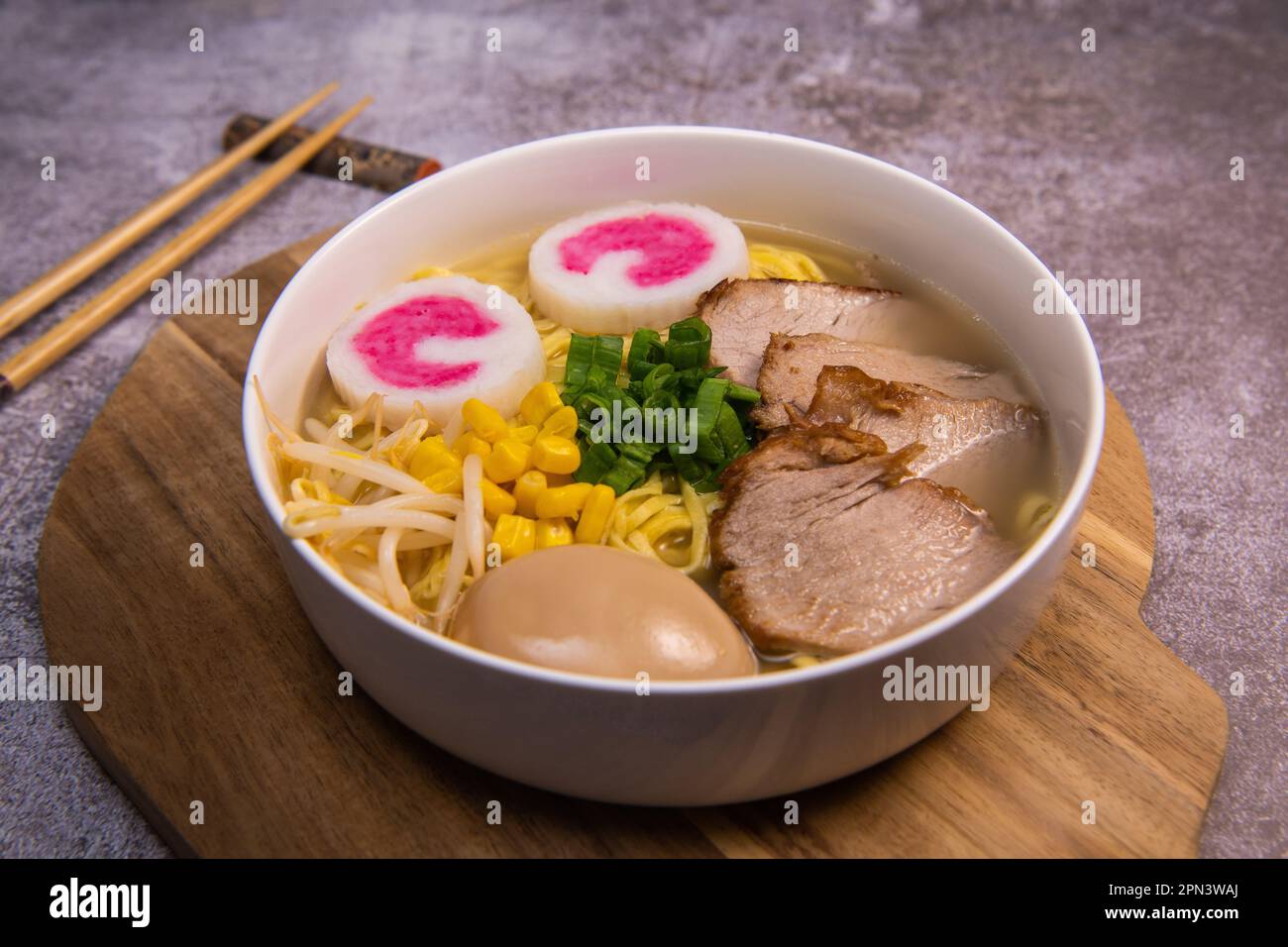 Fresh ramen noodles with garnish, pork tenderloin, eggs marinated in ...