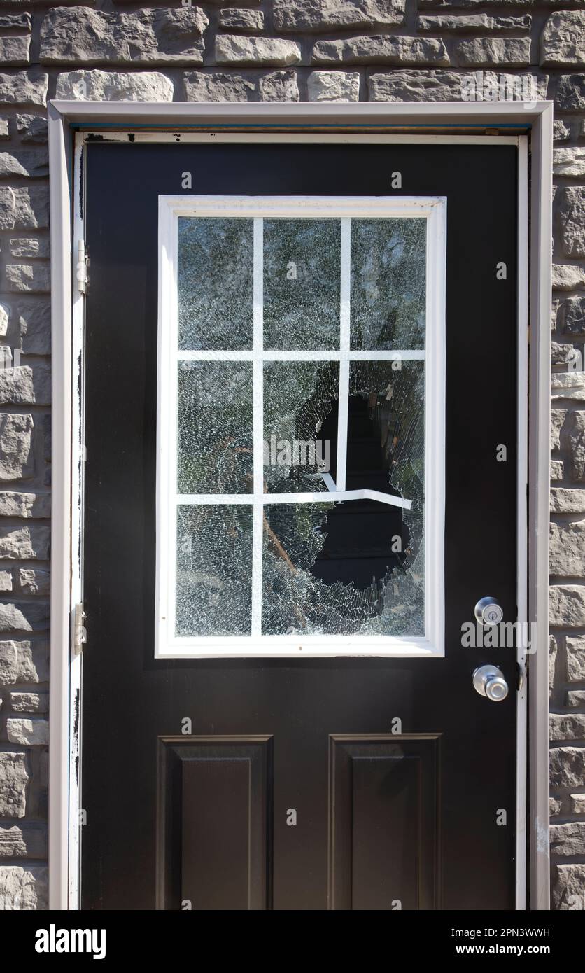 Broken glass. Forced entry. Do. Dry Stock Photo - Alamy