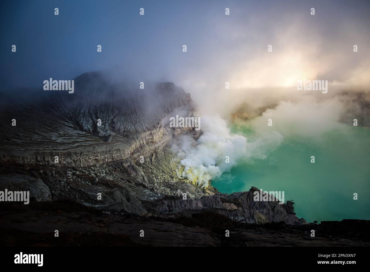 The acidic turquoise crater lake of Mount Ijen at sunrise, East Java ...