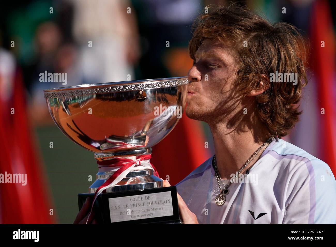 Andrey Rublev, of Russia, poses with his trophy after defeating Holger ...