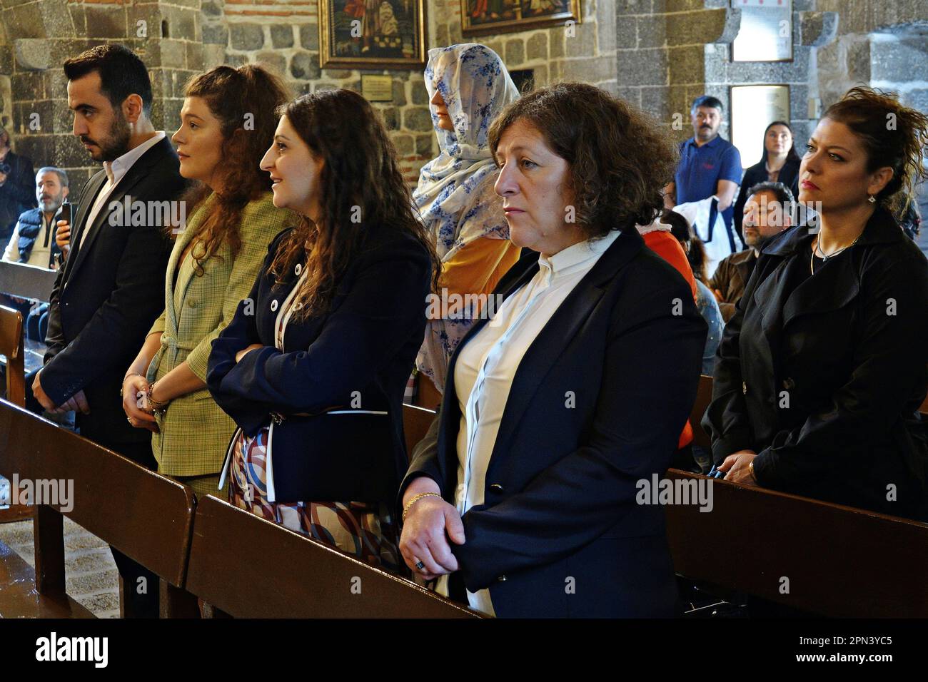 Assyrians attend the Easter Feast mass at the Syriac Virgin Mary Church ...