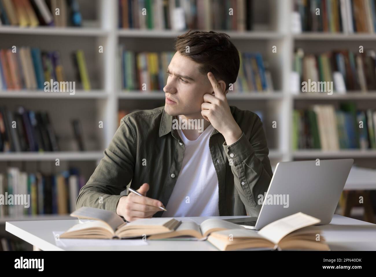 Student guy stuck on difficult task for hours without progress Stock ...