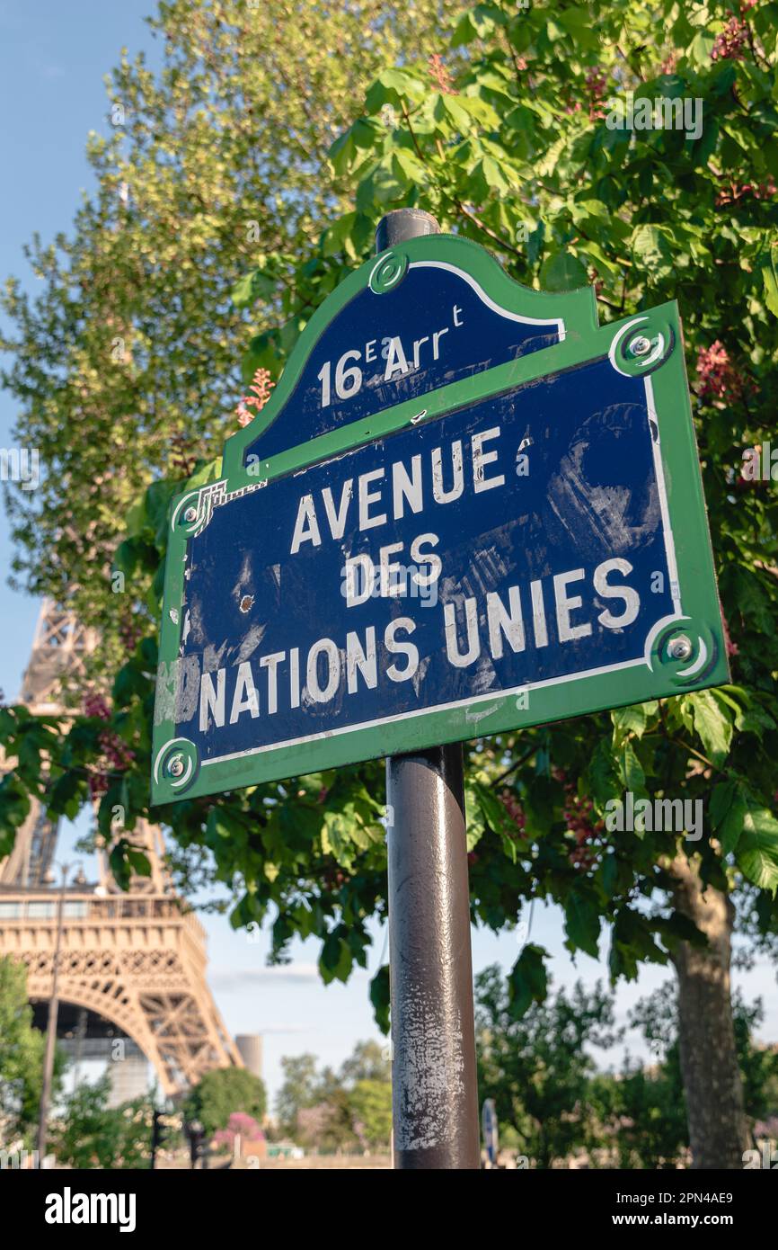 Classic road sign in the streets from Paris with Eiffel tower in the ...