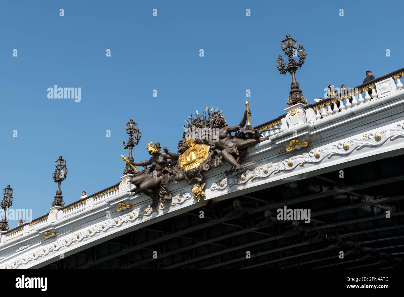 View to the Pont Alexandre Bridge. The bridge is a neo-baroque arch ...