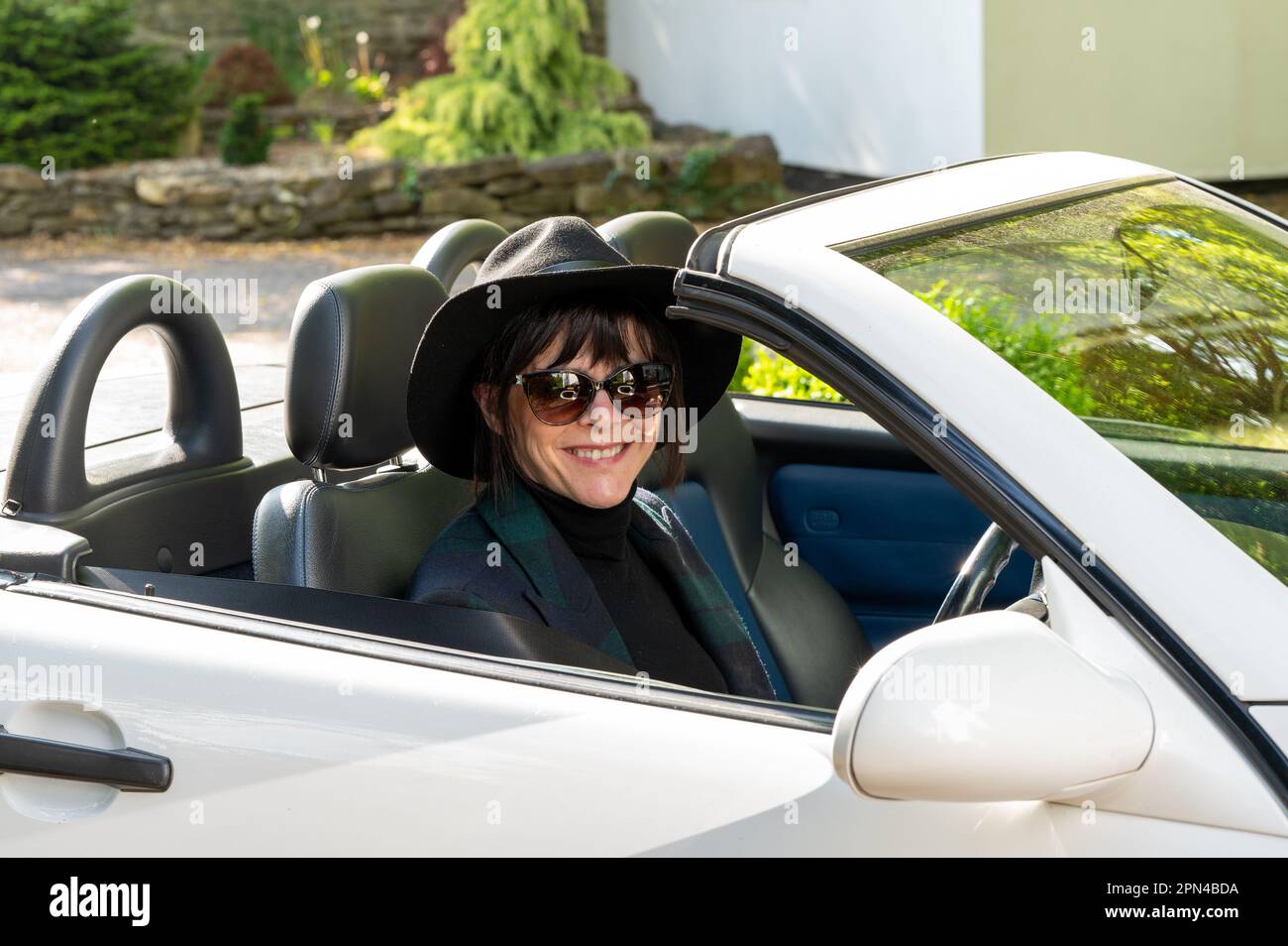 Active, stylish 60 year old woman enjoying life Stock Photo - Alamy