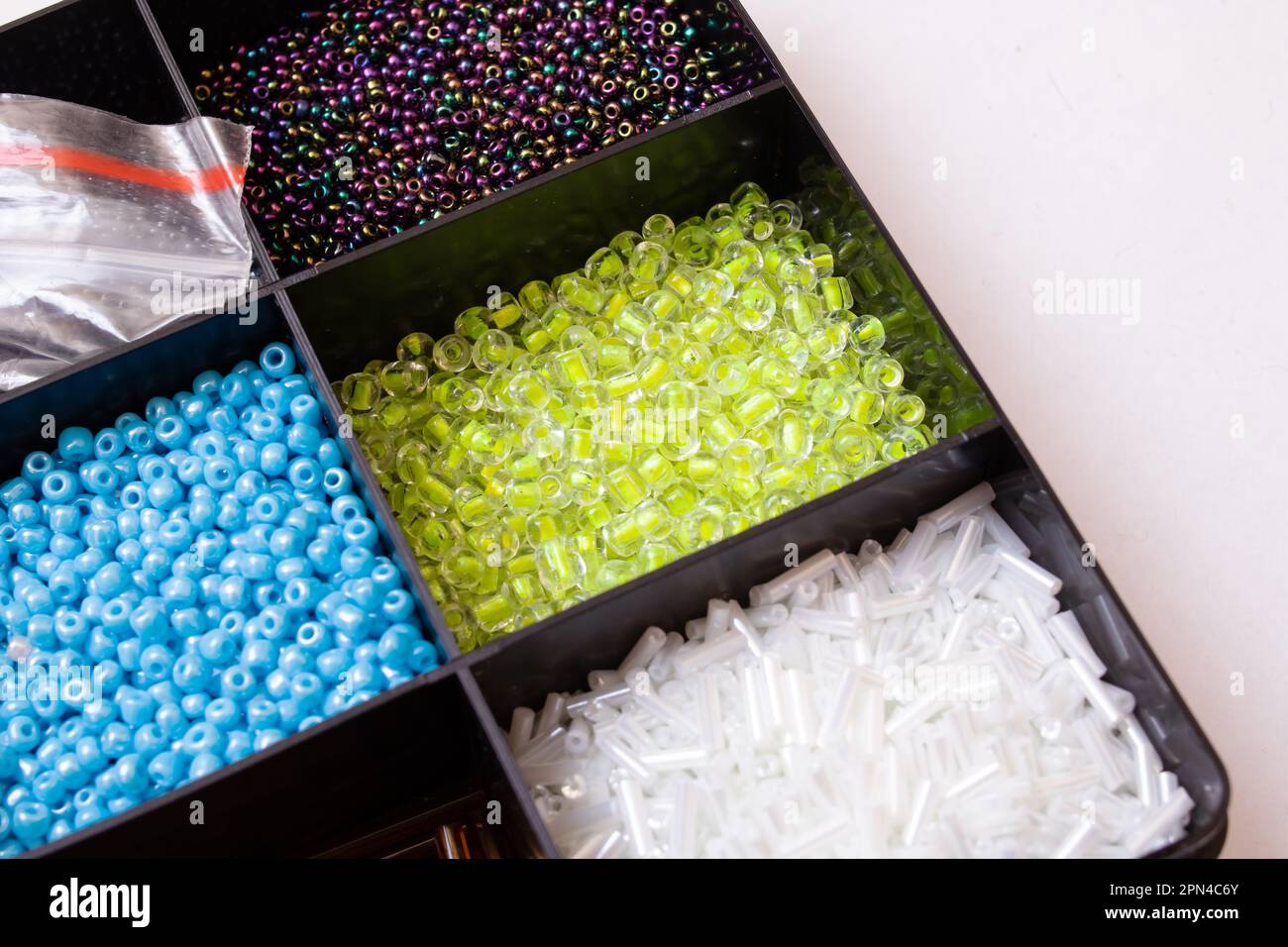 Plastic containers different beads hi-res stock photography and images ...