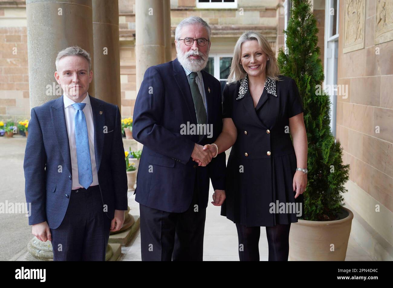 Gerry Adams is welcomed by Laura McCorry of Hillsborough Castle and ...