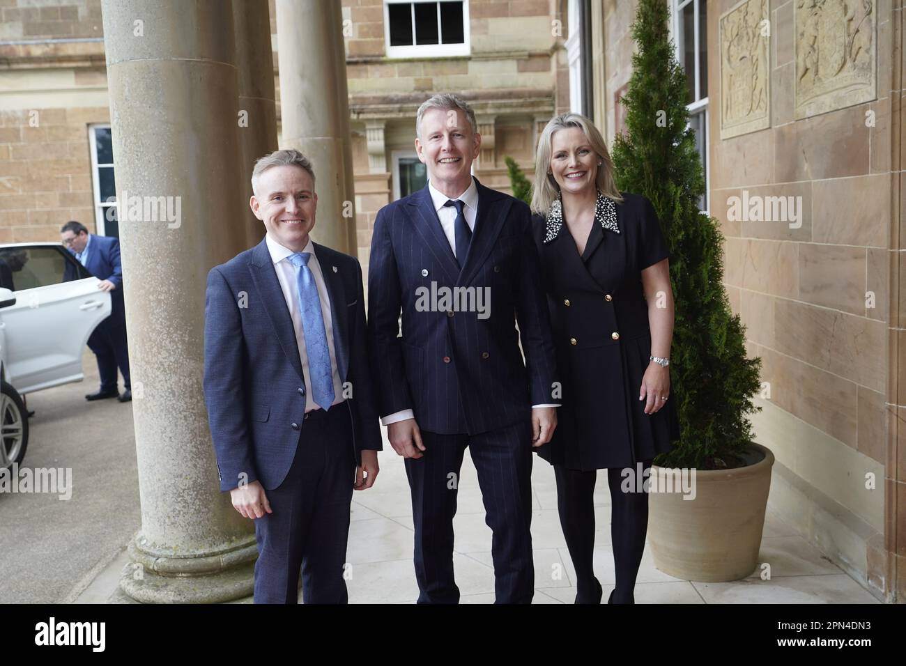 Patrick Kielty is welcomed by Laura McCorry of Hillsborough Castle and ...